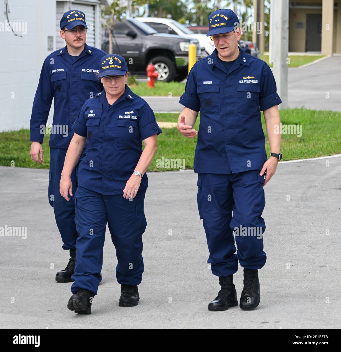 Rear Adm. John W. Mauger, commander, 1st District (right), discusses ...