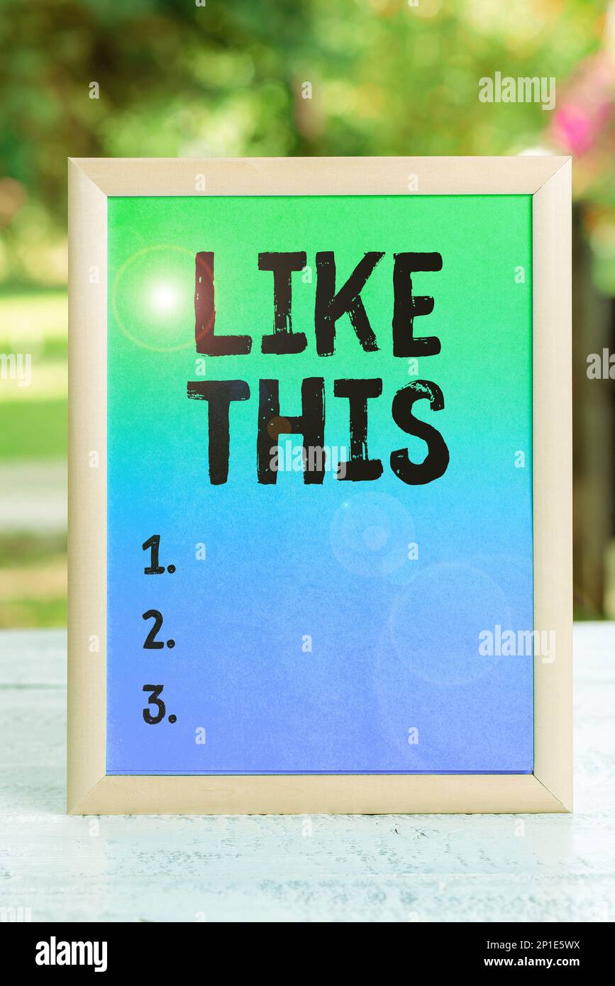 Hand writing sign Like This. Word for An action refering to something ...