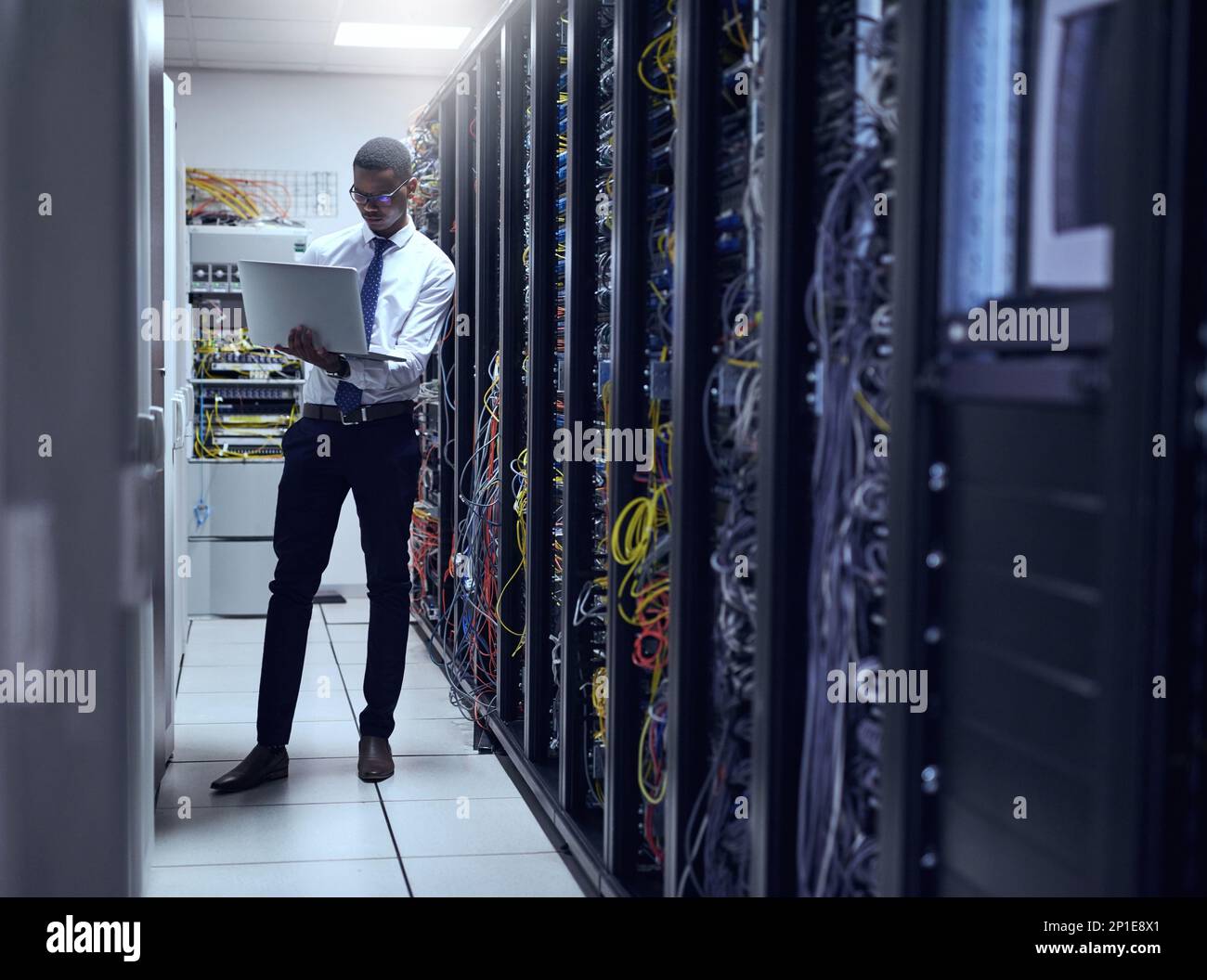 Every calculation counts. Cropped shot of a IT technician working on ...