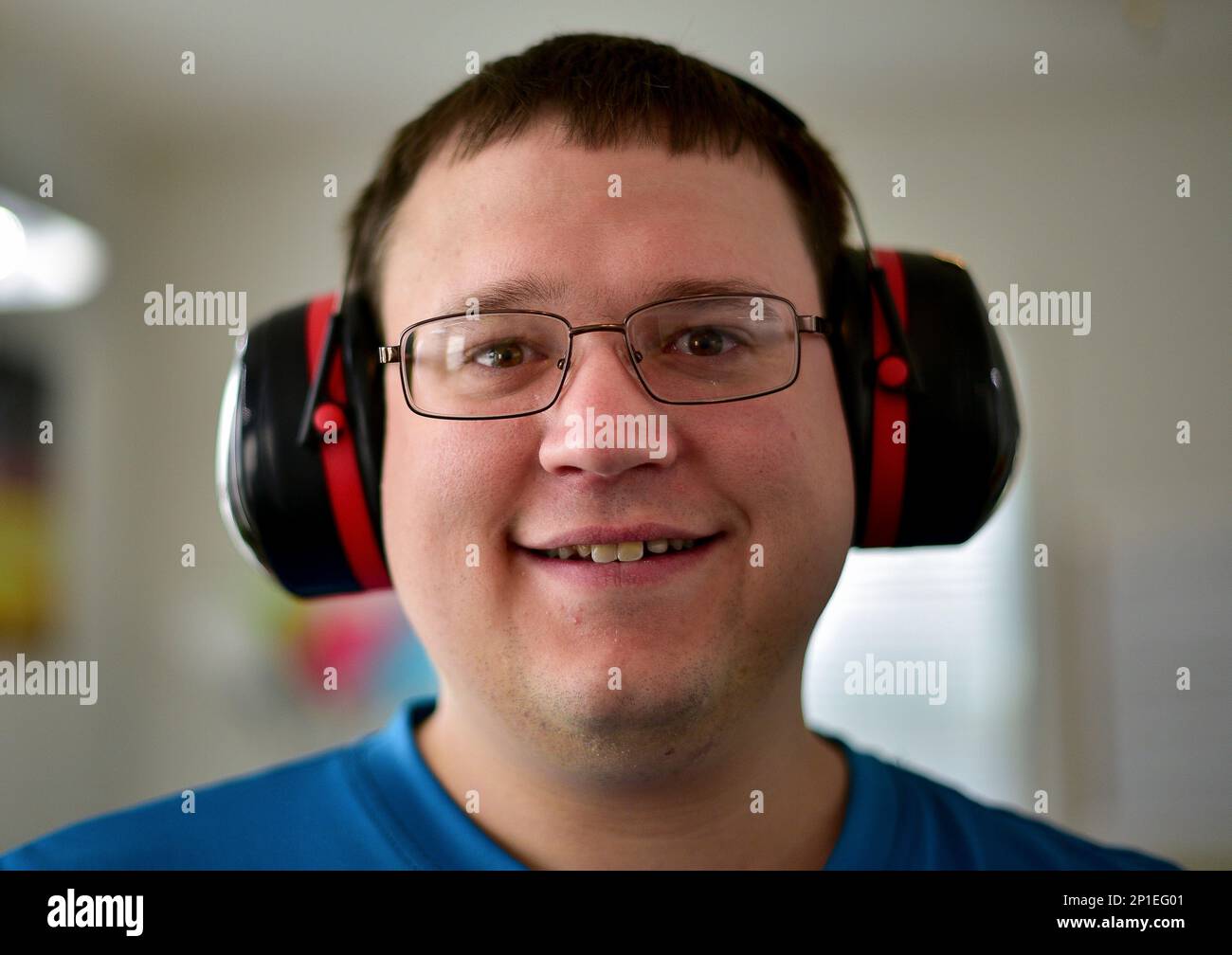 ADVANCE FOR WEEKEND - Adam Ankenman, 32, poses for a photo wearing his ...