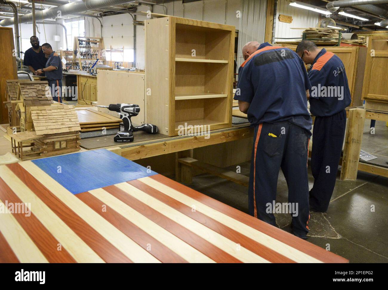 In this photo taken Monday, April 15, 2016, inmates practice learning ...