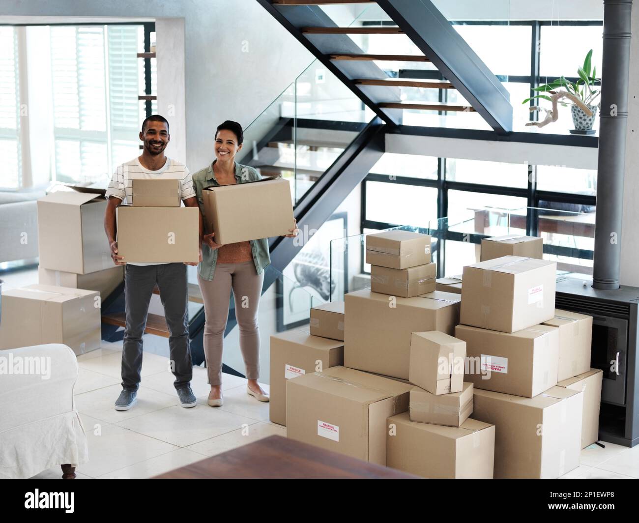 This is the last of the boxes. Portrait of a happy young couple ...