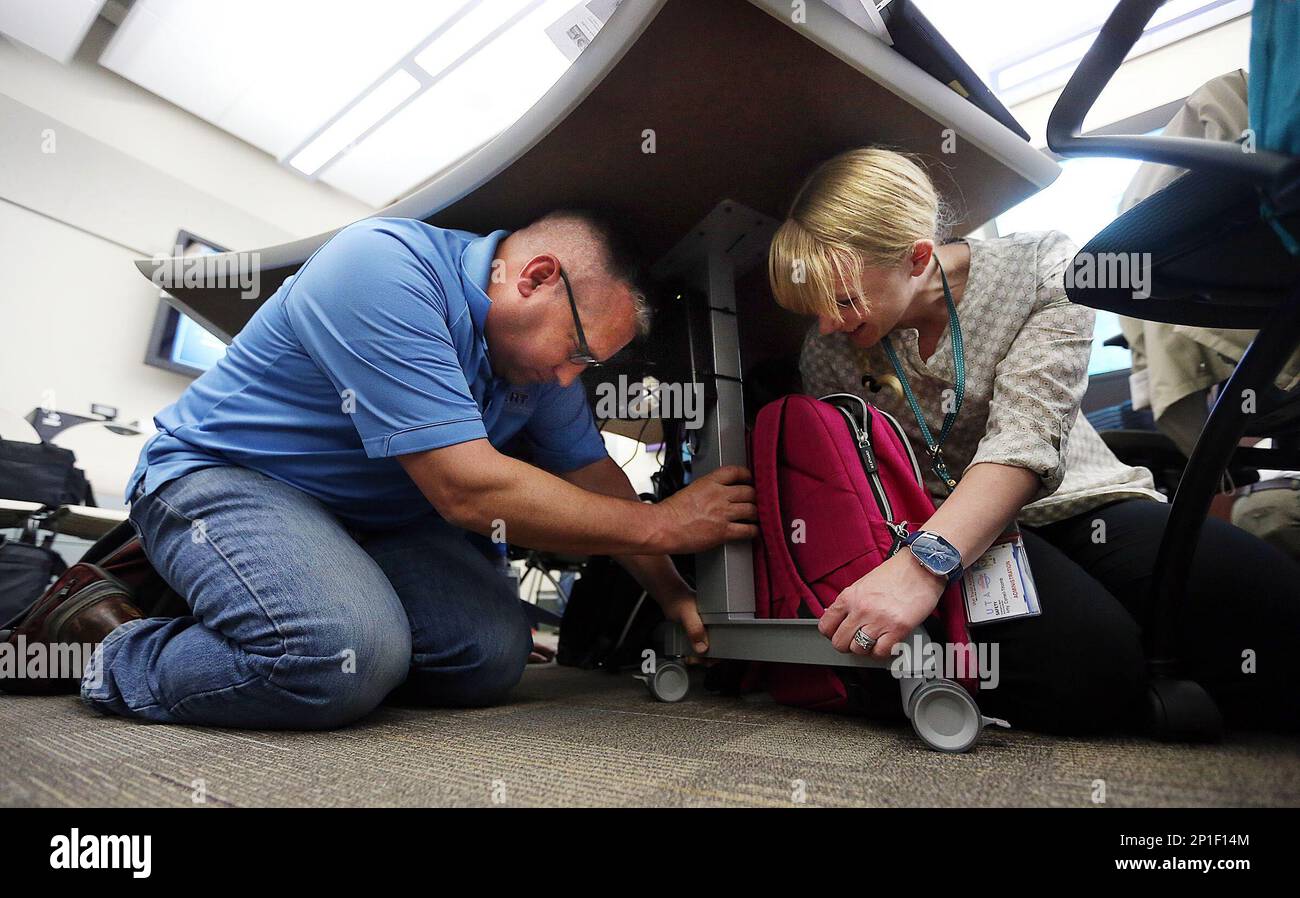 In this Thursday, April 21, 2016, photo, Ron Butler and Amy Cornell ...