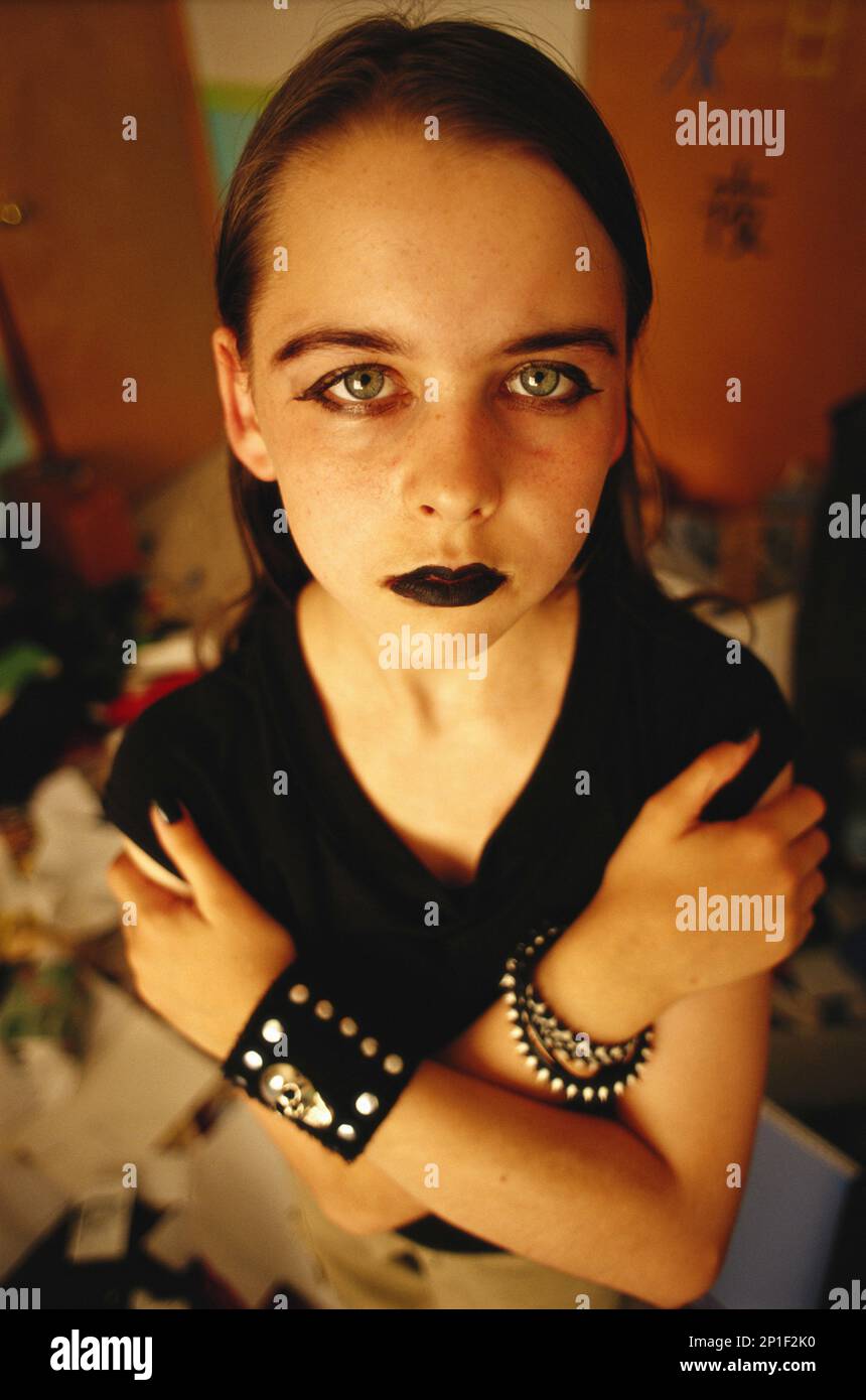 Young Goth teenager dressed in black and silver Stock Photo - Alamy