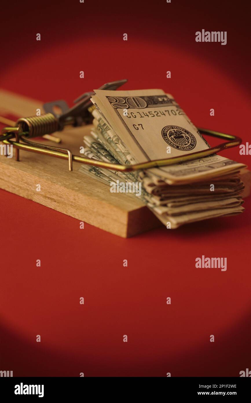Money caught in a mouse trap Stock Photo - Alamy Money caught in a mouse trap Stock Photo - Alamy