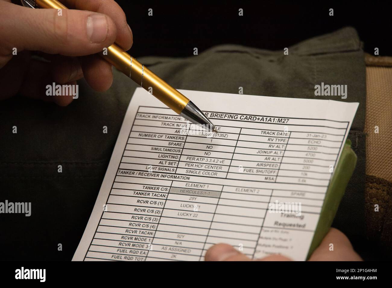 A U.S. Marine with Marine Aerial Refueler Transport Squadron 234 looks ...