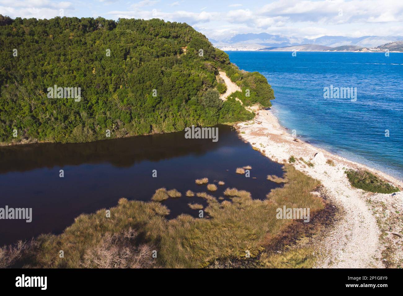 View of Erimitis coast landscape near Kassiopi and Agios Stefanos ...