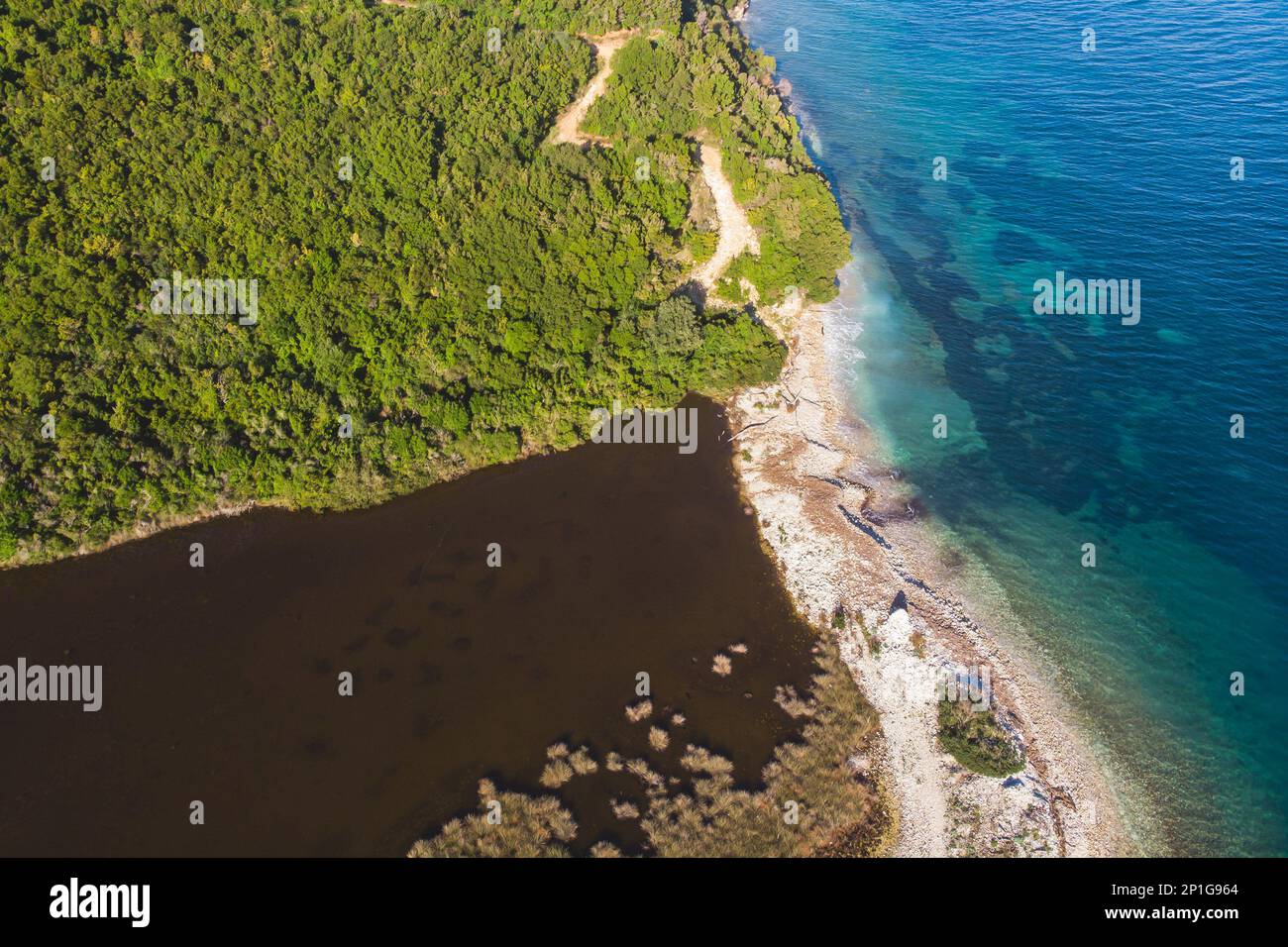View of Erimitis coast landscape near Kassiopi and Agios Stefanos ...