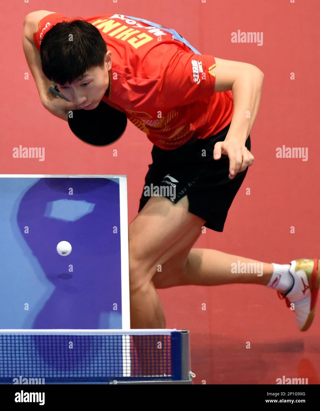 Ma Long of China serves against Maharu Yoshimura of Japan in their Men ...