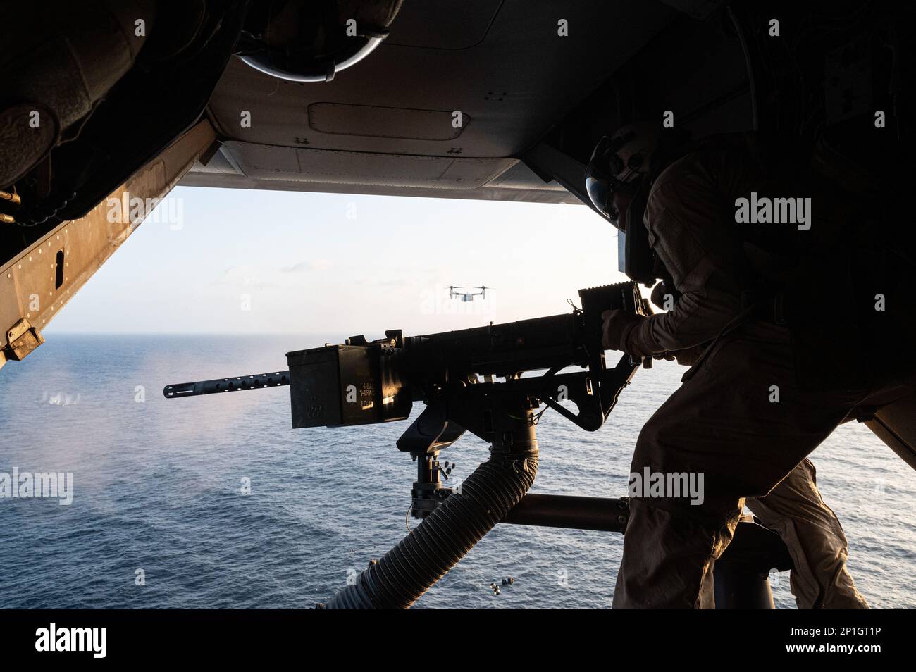 A U.S. Marine Corps MV-22 Osprey crew chief assigned to Marine Medium ...