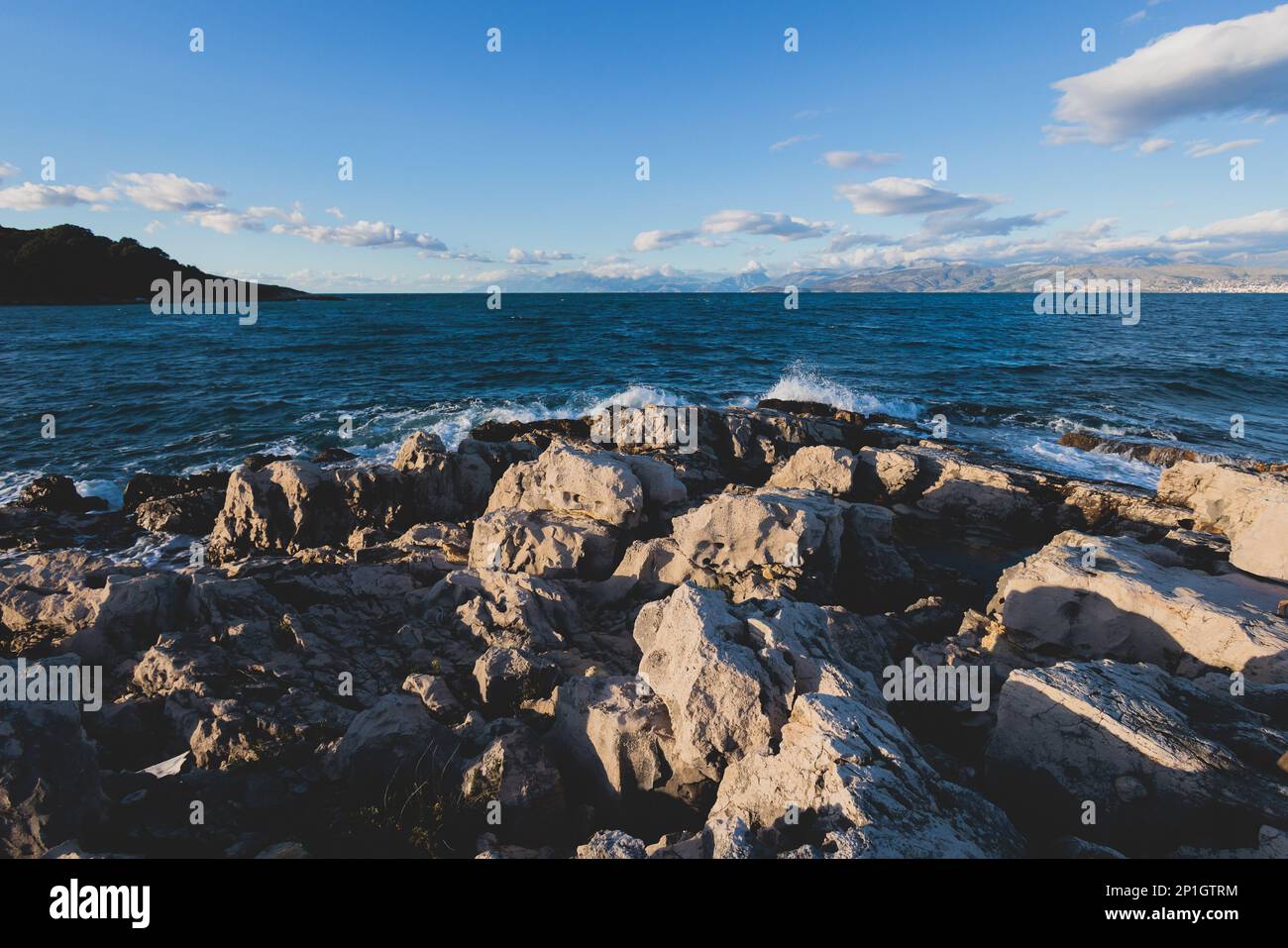 View of Erimitis coast landscape near Kassiopi and Agios Stefanos ...