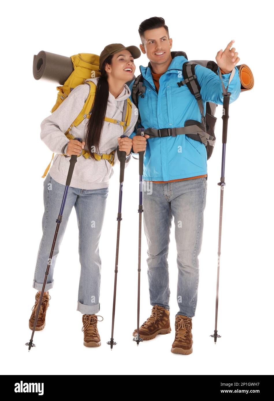 Couple Of Hikers With Backpacks And Trekking Poles On White Background