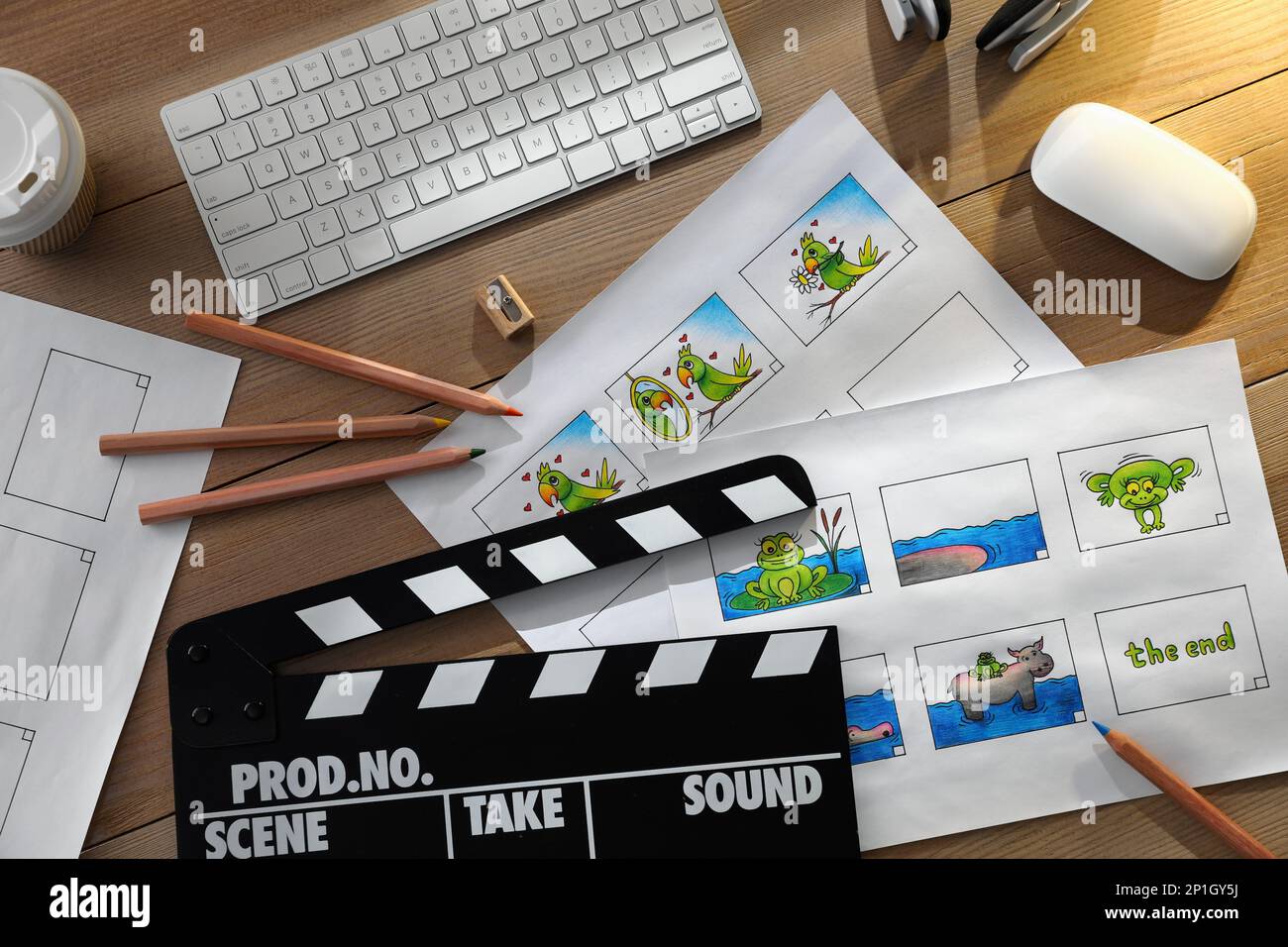 Storyboards with cartoon sketches at workplace, flat lay. Pre ...