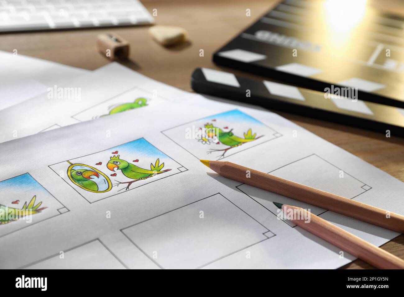 Storyboards with cartoon sketches at workplace, closeup. Pre-production ...