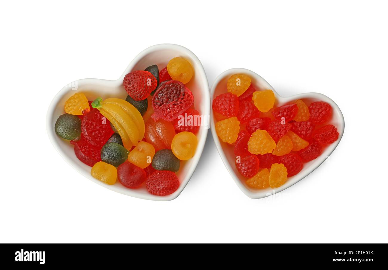 Delicious gummy fruit shaped candies on white background, top view ...