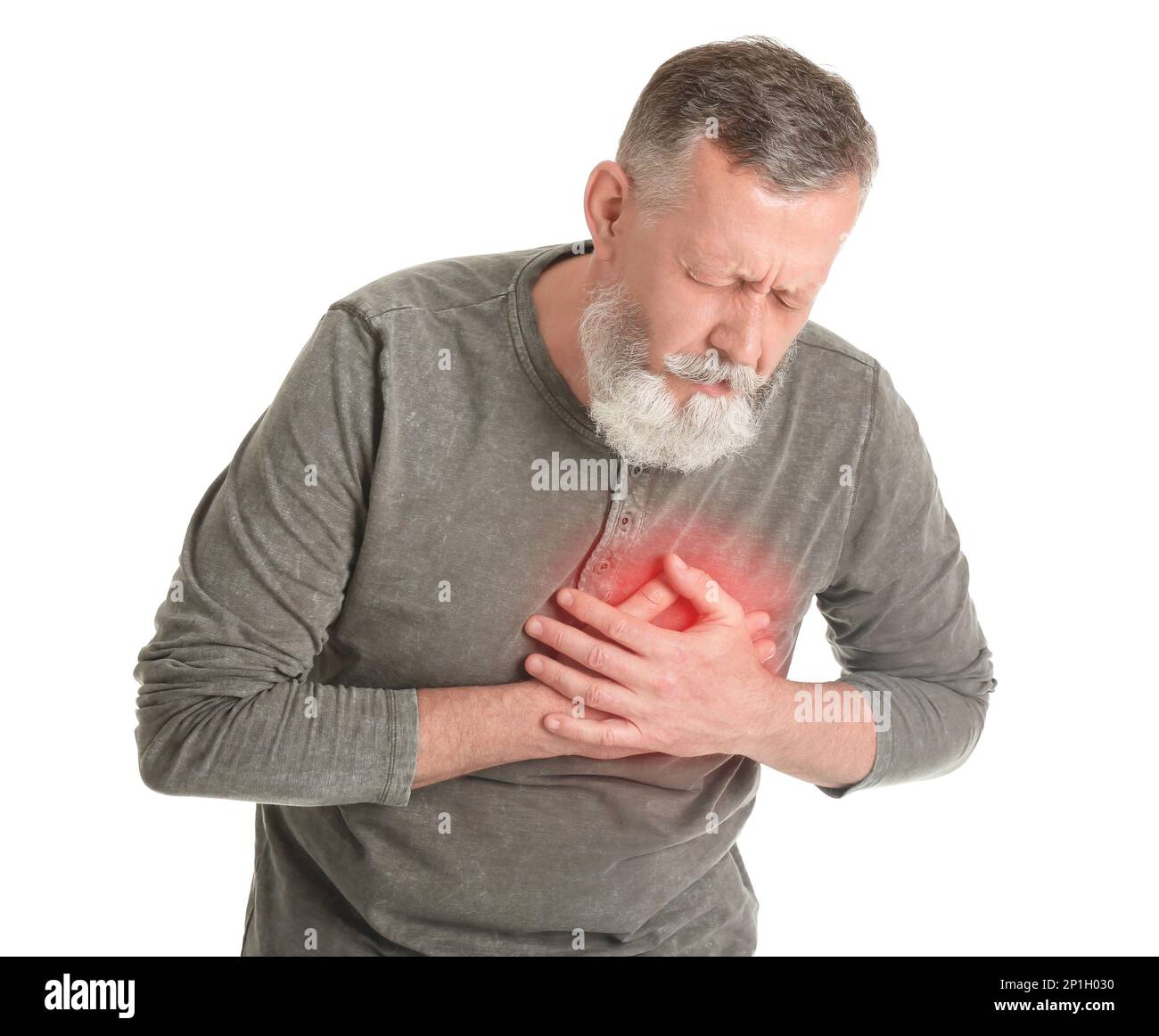 Mature man having heart attack on white background Stock Photo - Alamy
