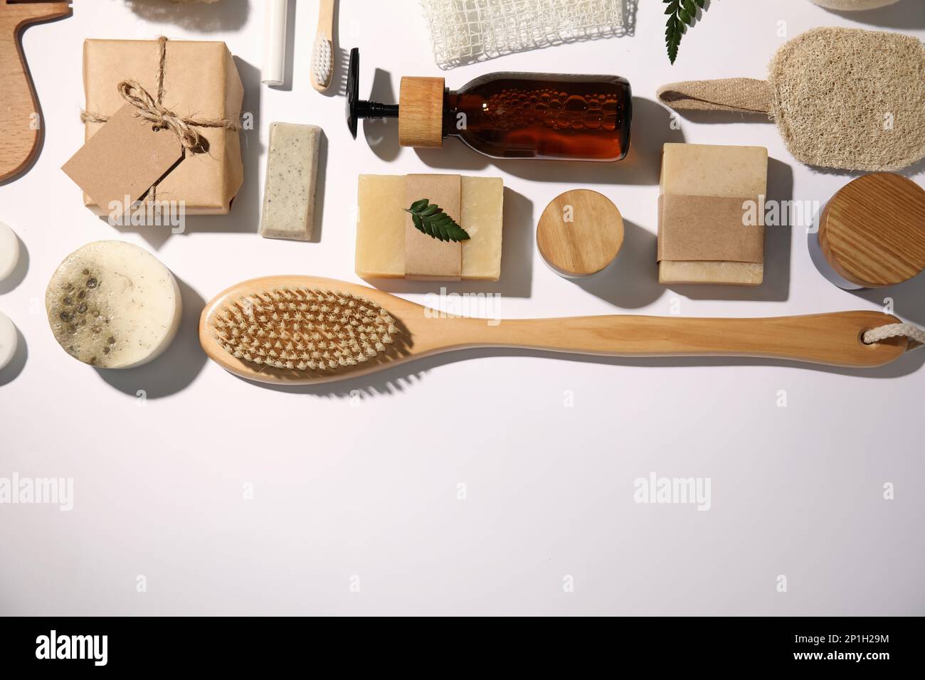 Flat lay composition with eco friendly personal care products on white ...