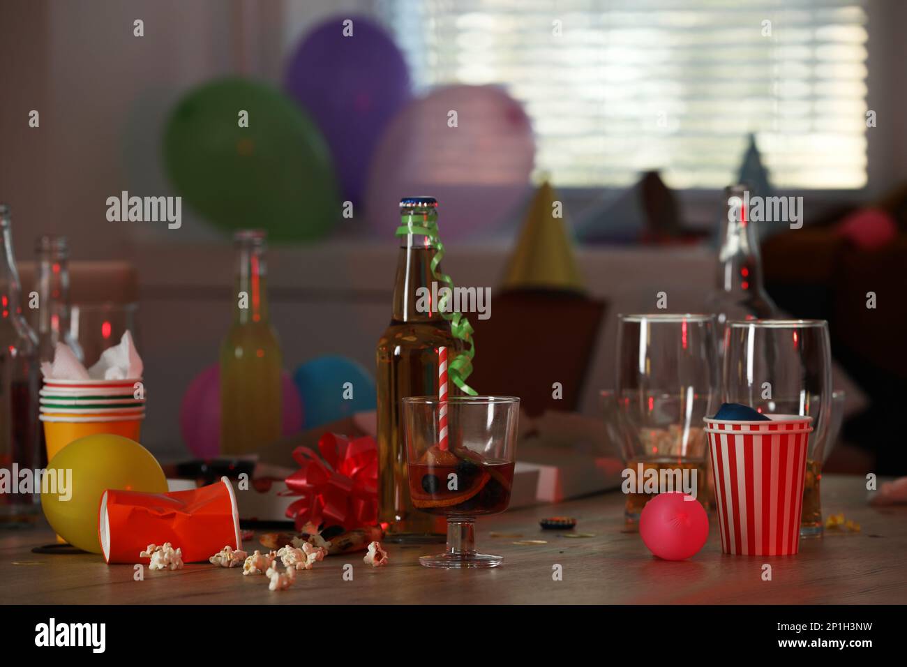 View of messy table after party indoors Stock Photo - Alamy