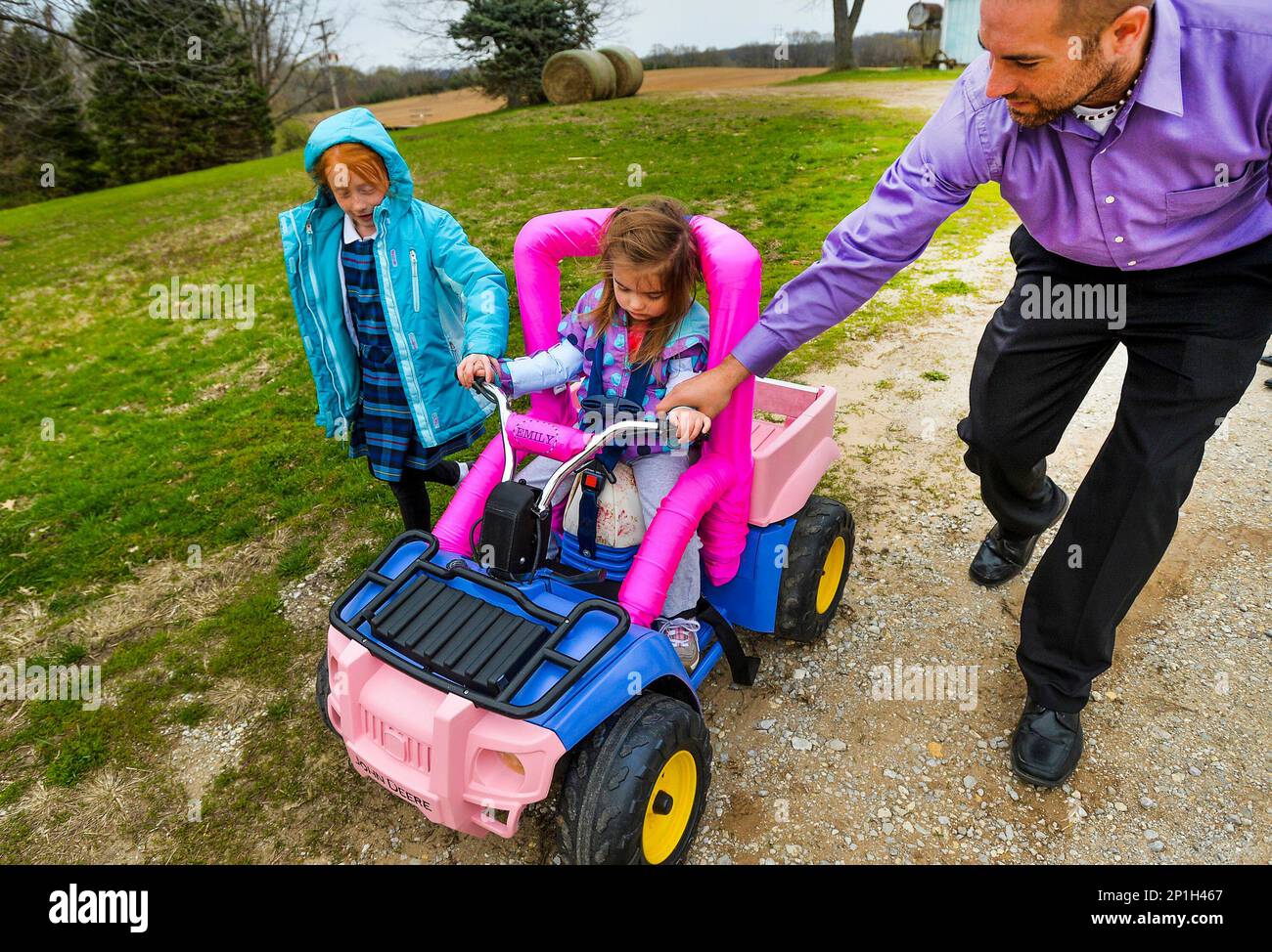 In this April 5, 2016 photo, Derrick Heflin, and daughter Ella, left ...