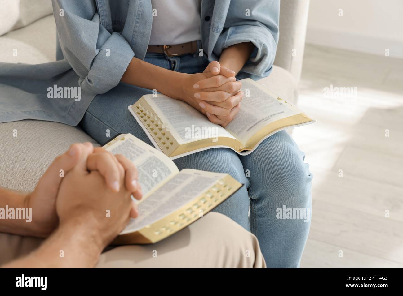 Two people praying together hi-res stock photography and images - Alamy