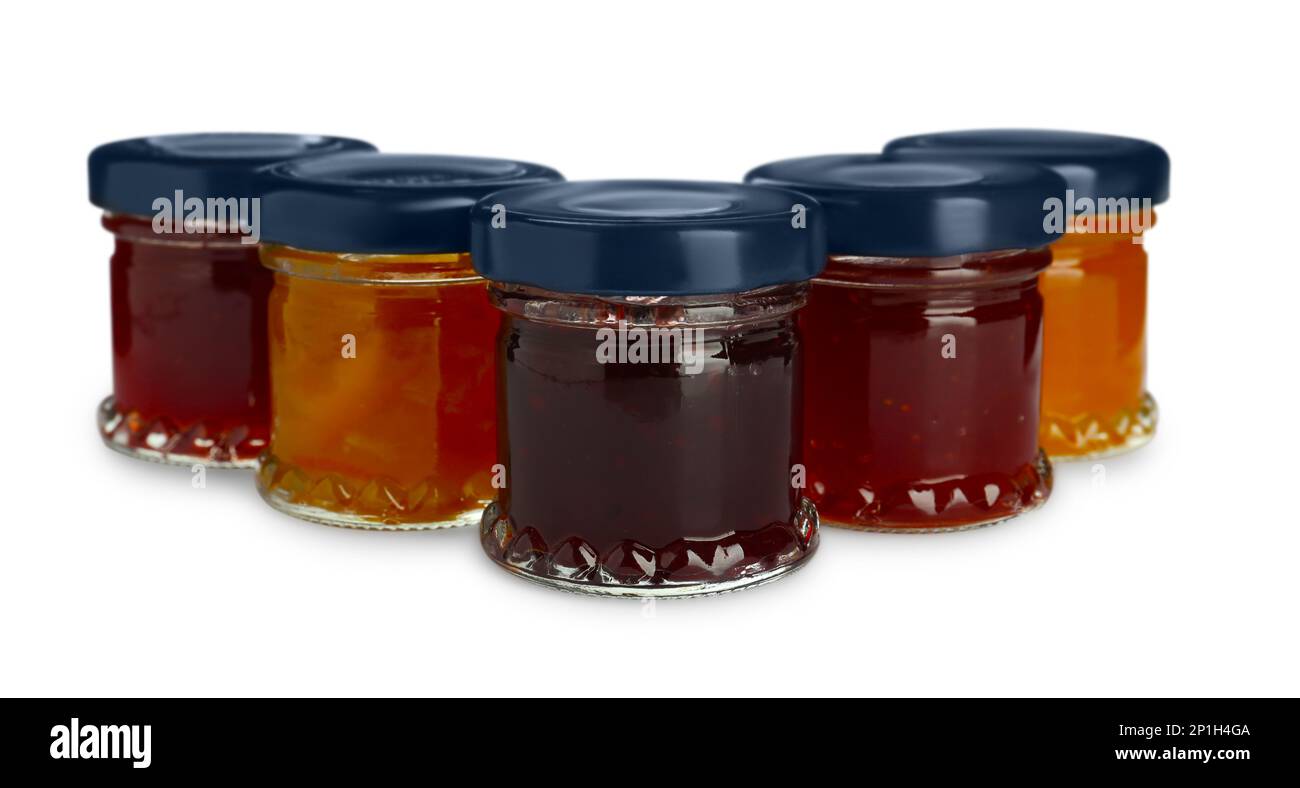 Jars with different jams on white background Stock Photo - Alamy