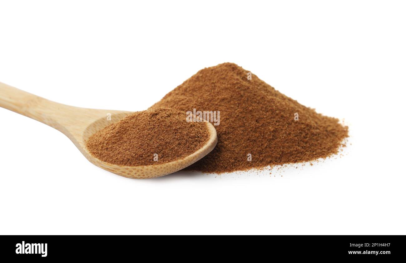 Spoon and chicory powder on white background Stock Photo - Alamy