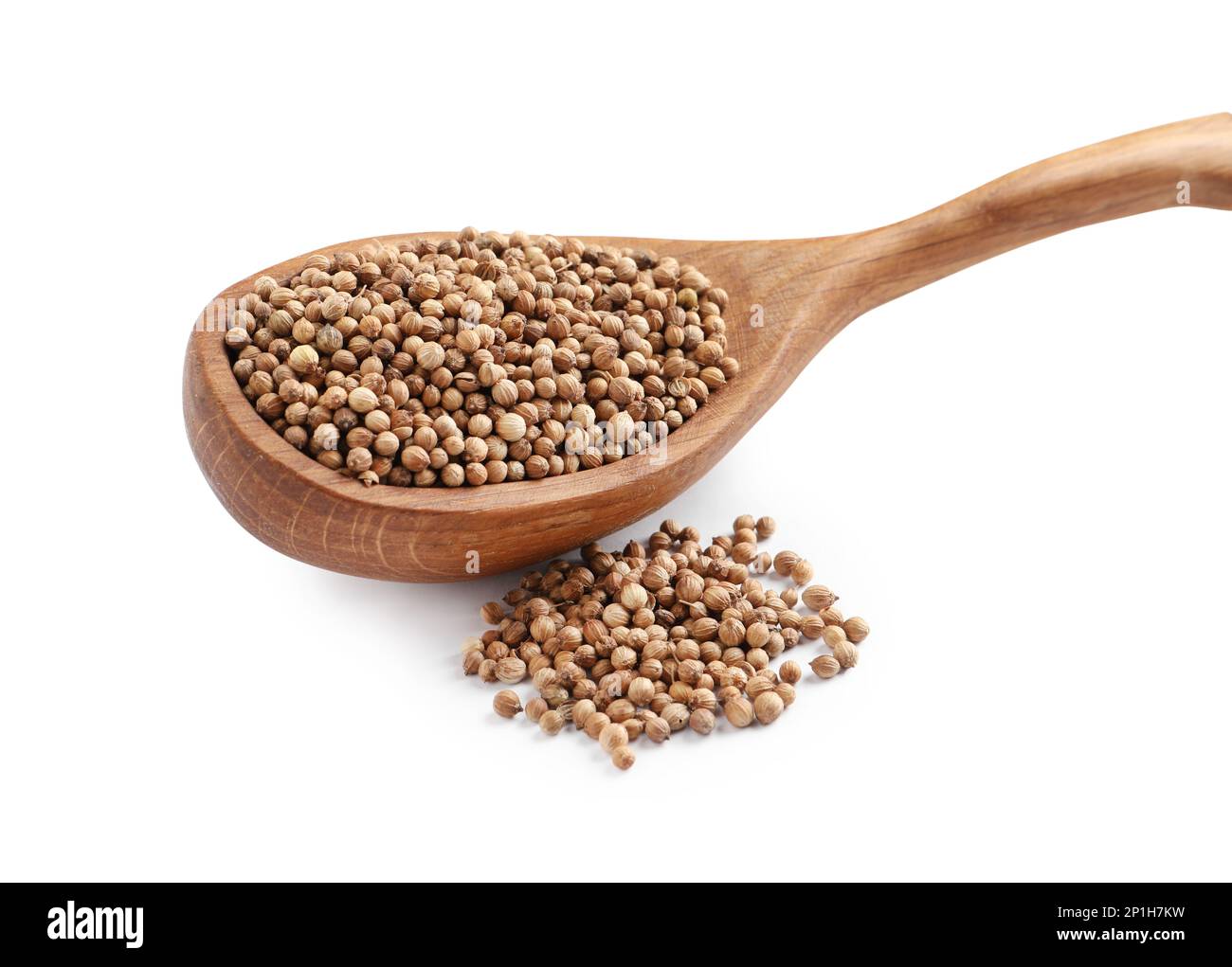 Dried coriander seeds with wooden spoon on white background Stock Photo ...