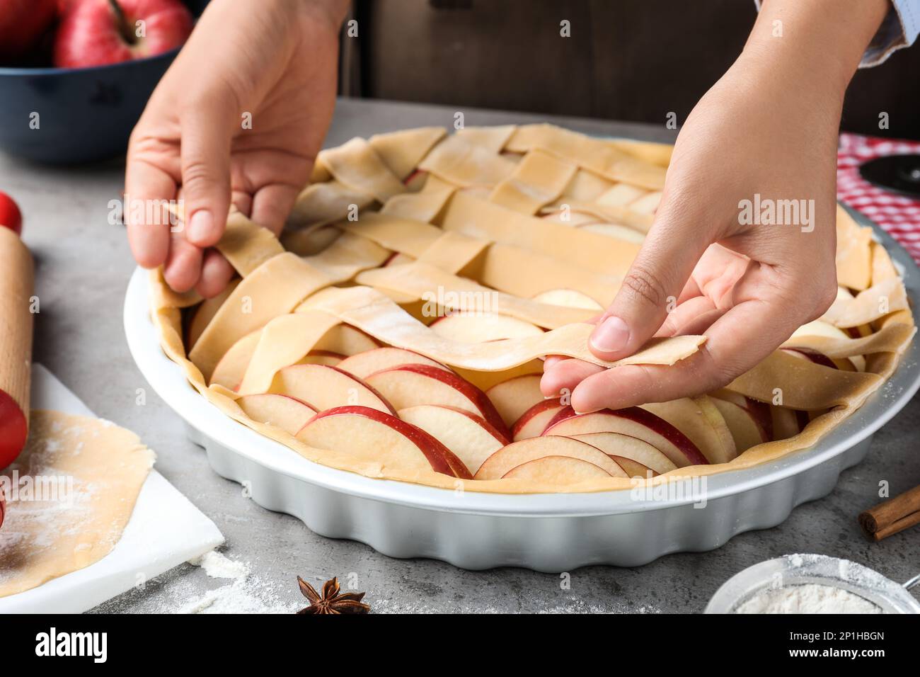 Woman decorating raw apple hi-res stock photography and images - Alamy