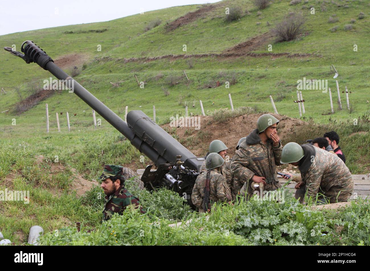 Karabakh Armenian soldiers stand near a howitzer in Hadrut province in ...