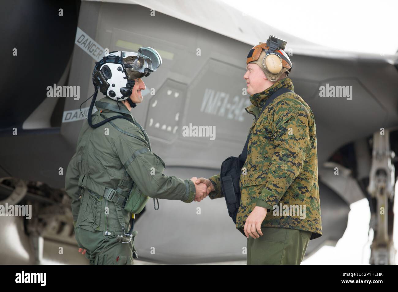 U.S. Marine Corps Capt. Addison Dishart, a pilot, left, greets Lance ...