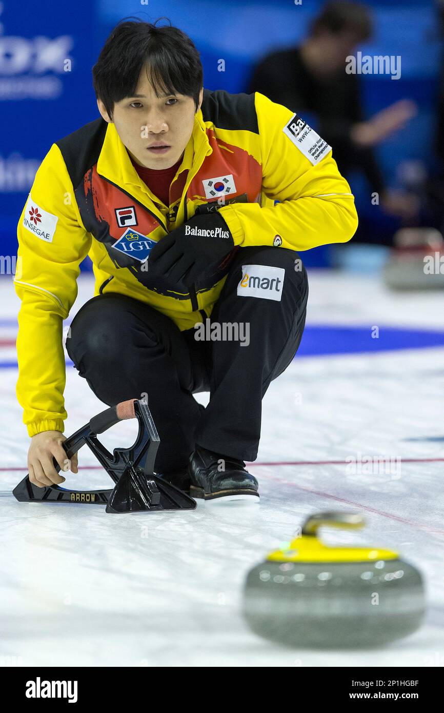 Korea's skip Kim Soo-hyuk Kim competes in a round robin match between ...