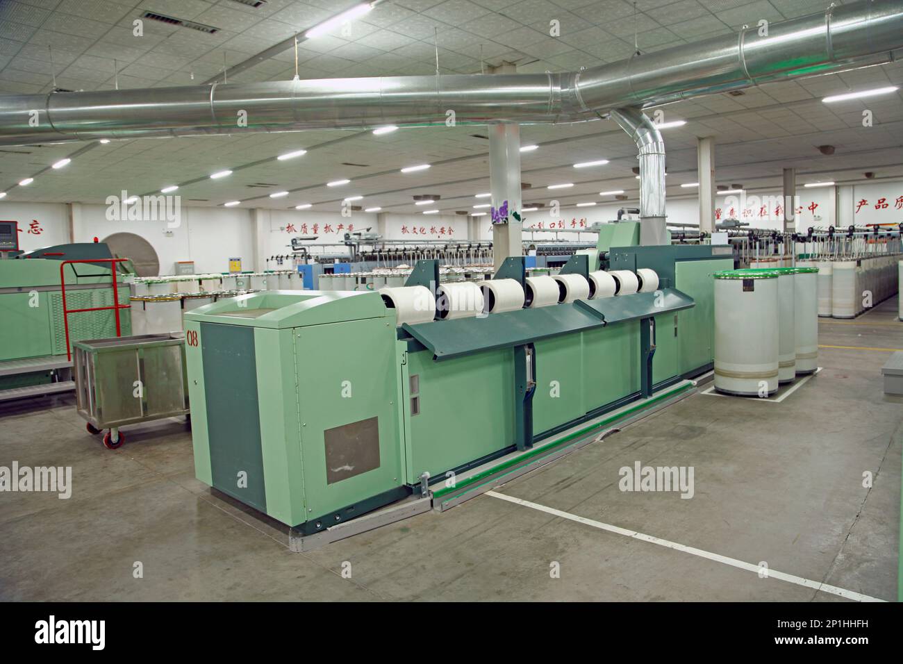 Cotton group in spinning production line factory Stock Photo - Alamy