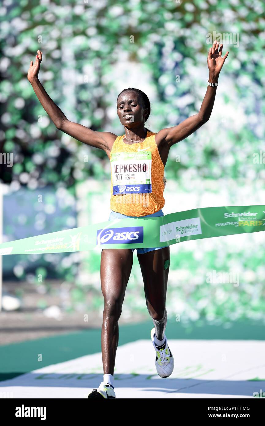 Visiline Jepkesho (KEN) celebrates after crossing the finish line to ...