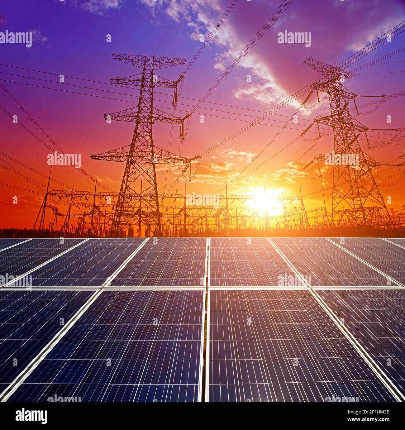 Solar panels and pylon, green environmental protection Stock Photo - Alamy