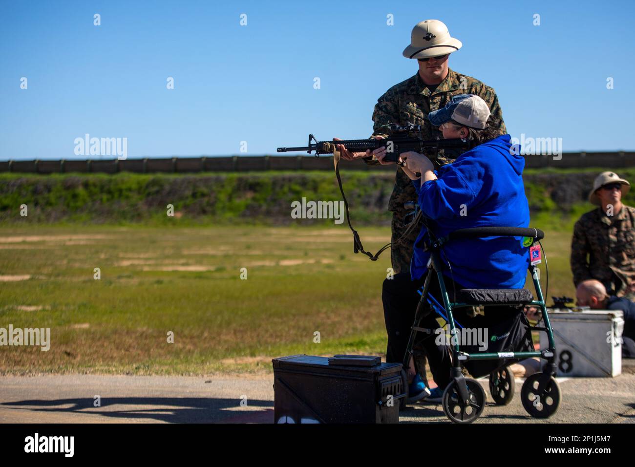 A U.S. Marine Corps Range Coach with Weapons Field Training Battalion ...