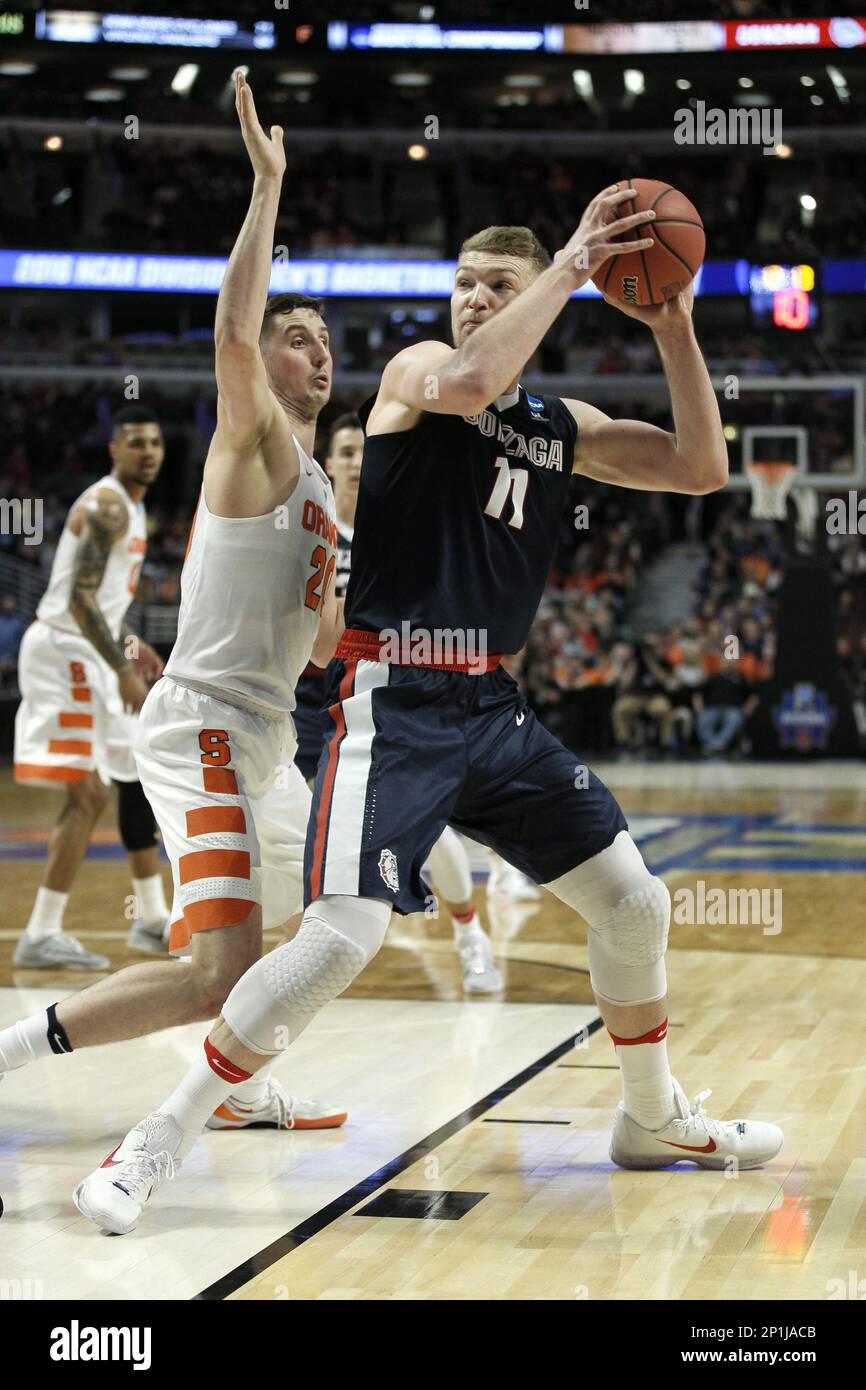 25 March 2016: F Tyler Lydon (20) of the Syracuse Orange guards F Domantas Sabonis (11) of the ...