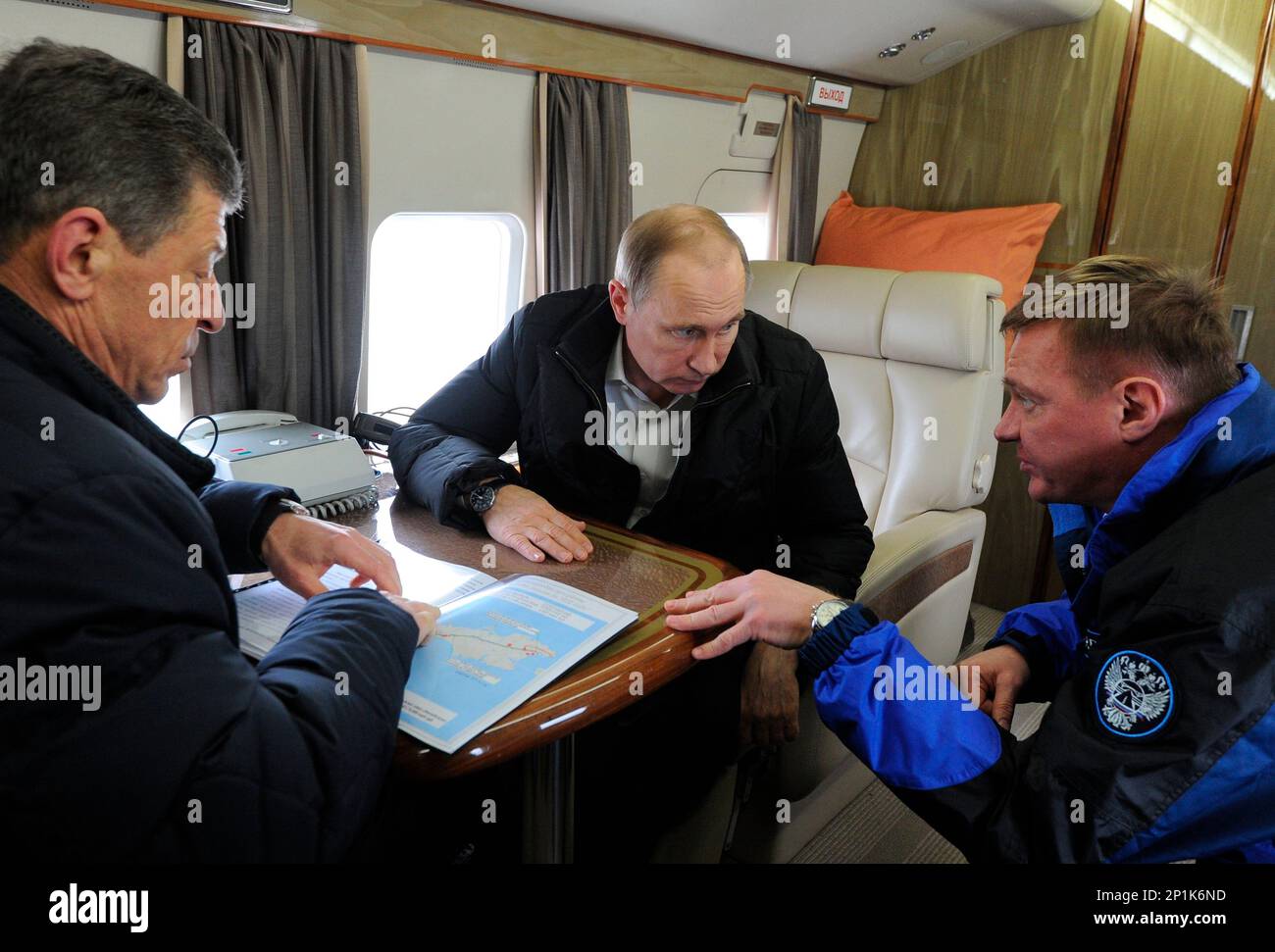 Russian President Vladimir Putin, center, speaks with Federal highway ...