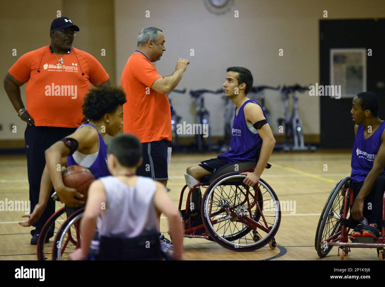 Samuel Armas (16) listens to his coach Paul Hutchinson's instruction ...