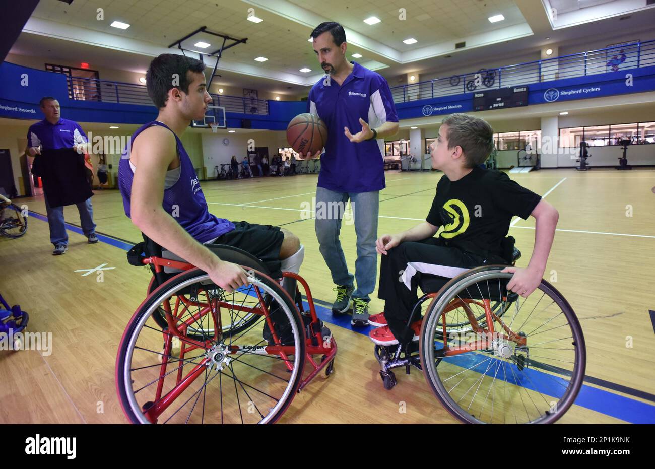 Alex Armas gives some feedbacks to his sons Samuel (16) and Zachary (10 ...
