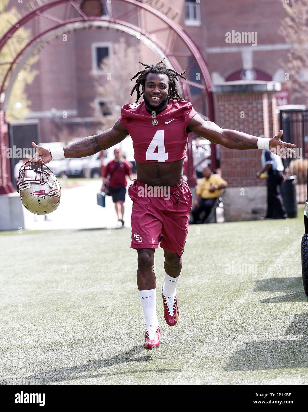 Florida State Runningback Dalvin Cook #4 runs on the field before the ...