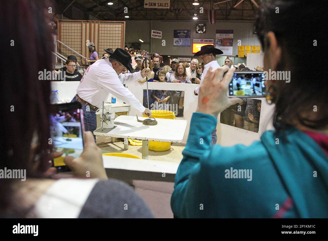 Spectators film Lance Shaw, a member of the Sweetwater Junior Chamber ...