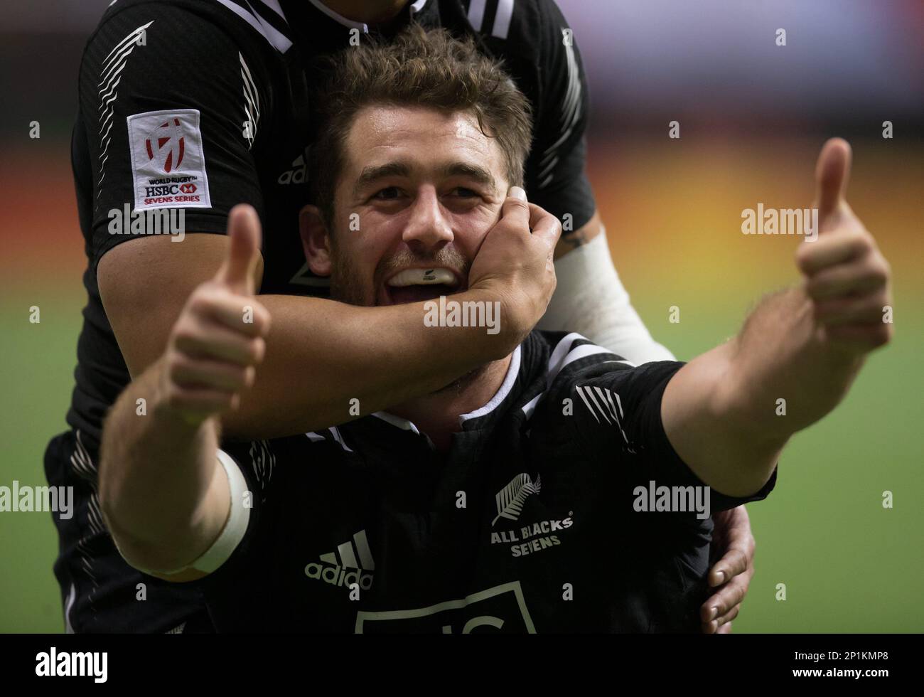 New Zealand's Kurt Baker and Sherwin Stowers, back, celebrate Baker's ...