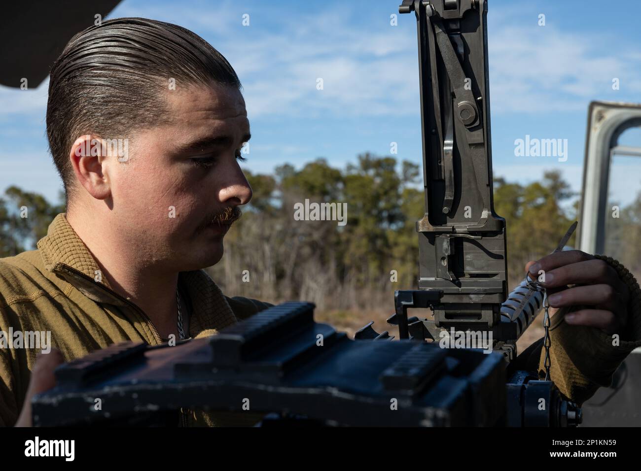 U.S. Marine Corps Cpl. Brennan Conley, a UH-1Y Venom crew chief with ...