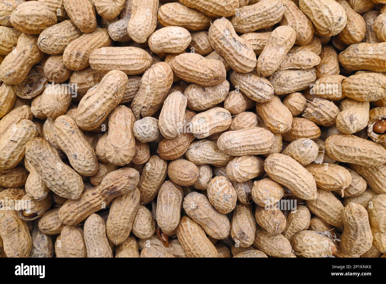 Close-up on a stack of peanuts for sale on a market stall Stock Photo ...