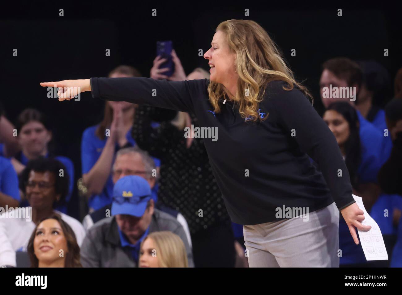 UCLA head coach Cori Close motions to her team during the first half of ...