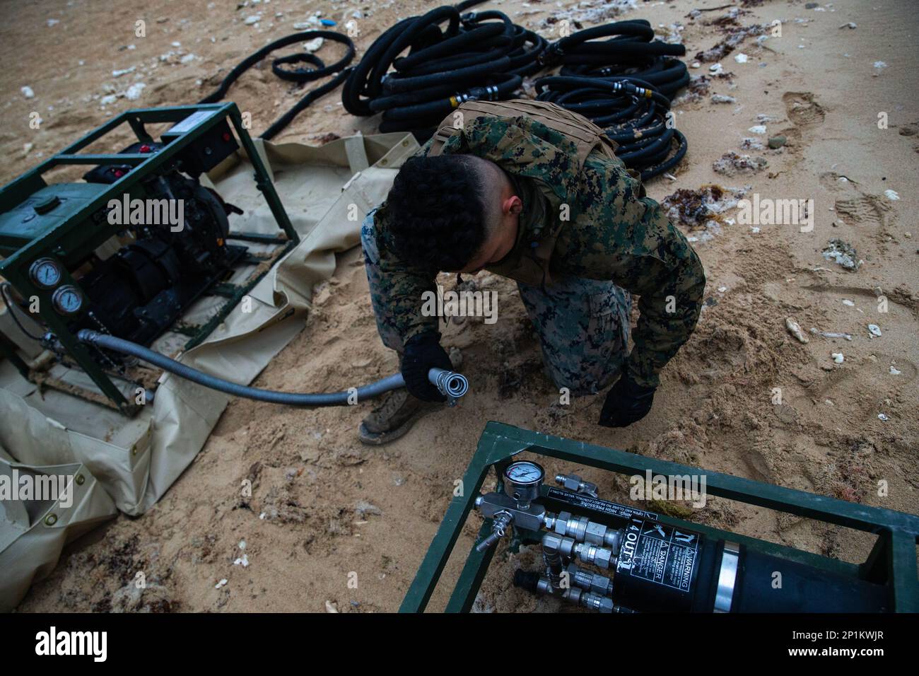 U.S. Marine Corps Lance Cpl. Severo Luna, a water support technician ...