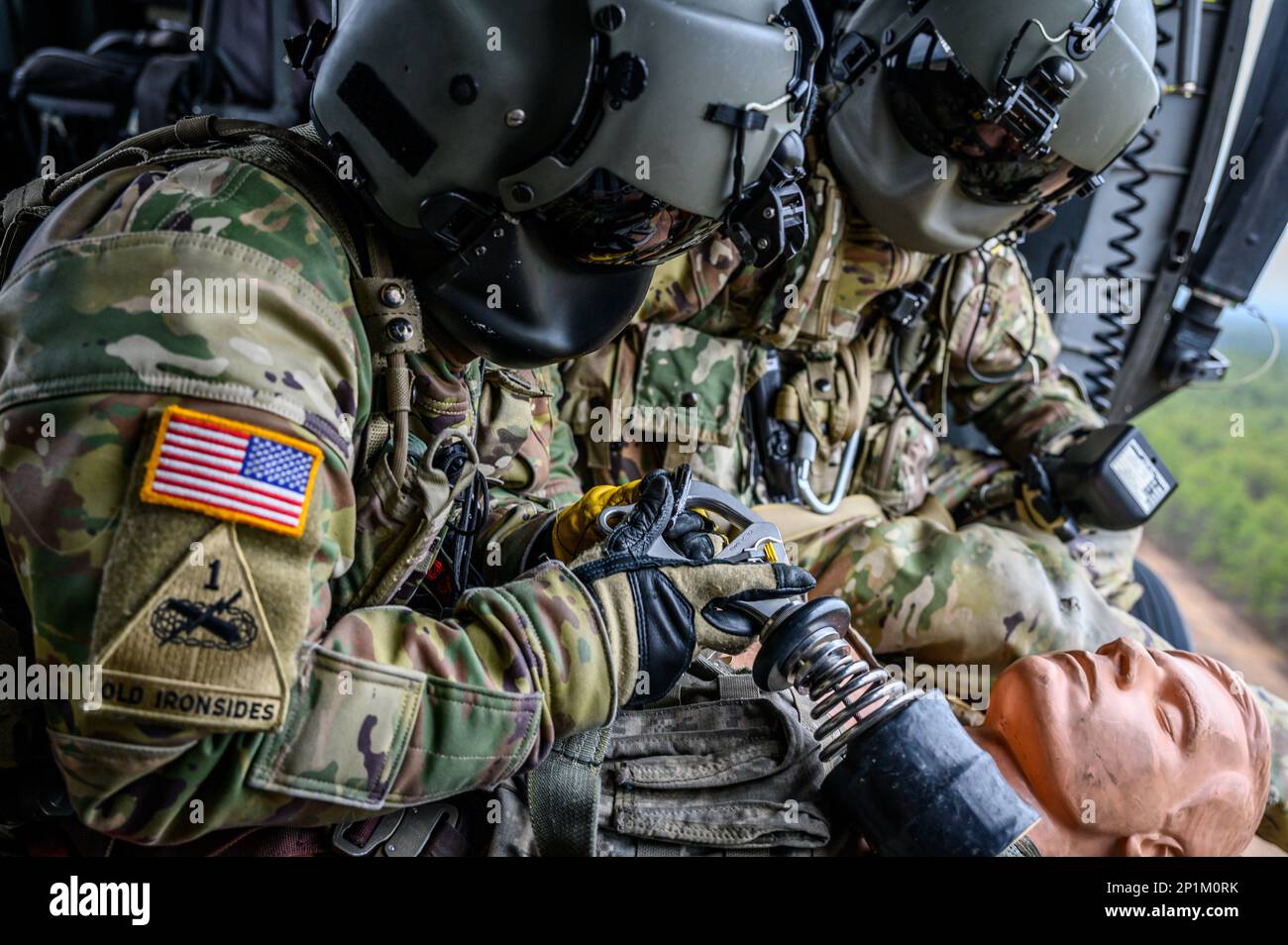 U.S. Army Staff Sgt. Anthony Marotta, left, and Sgt. Jeff Angle, UH-60L ...
