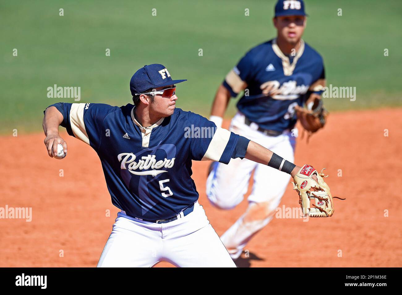 6 March 2016: FIU infielder Austin Rodriguez (5) throws to first base ...