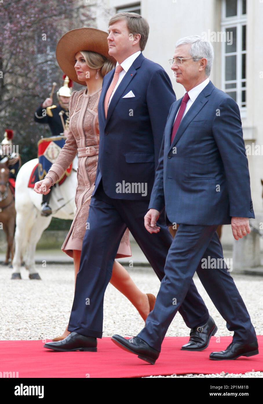 French National Assembly speaker Claude Bartolone, right, greets King ...