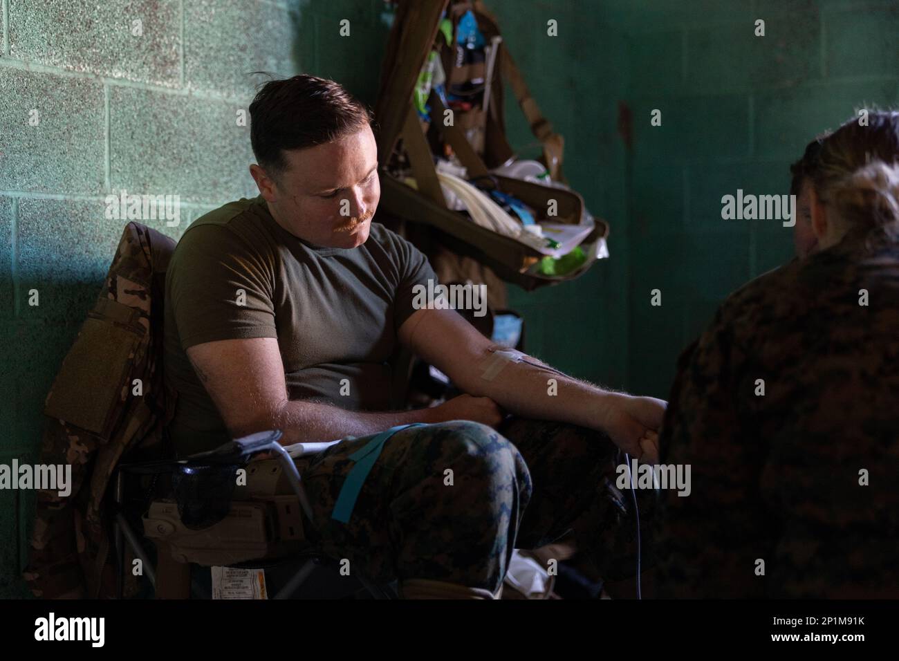 U.S. Navy Hospital Corpsman 1st Class Dustin Alexander, with 2nd ...